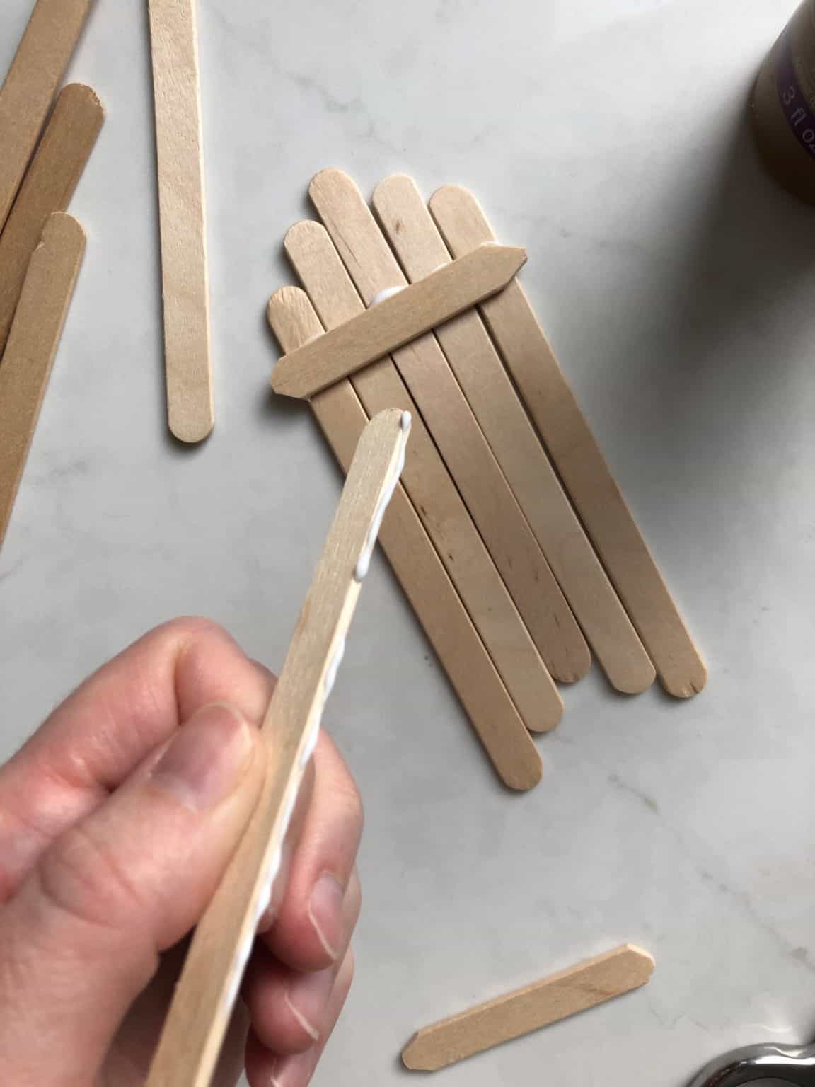 Popsicle stick sled ornaments for festive fun ️ 🛷 Dive into creativity ...