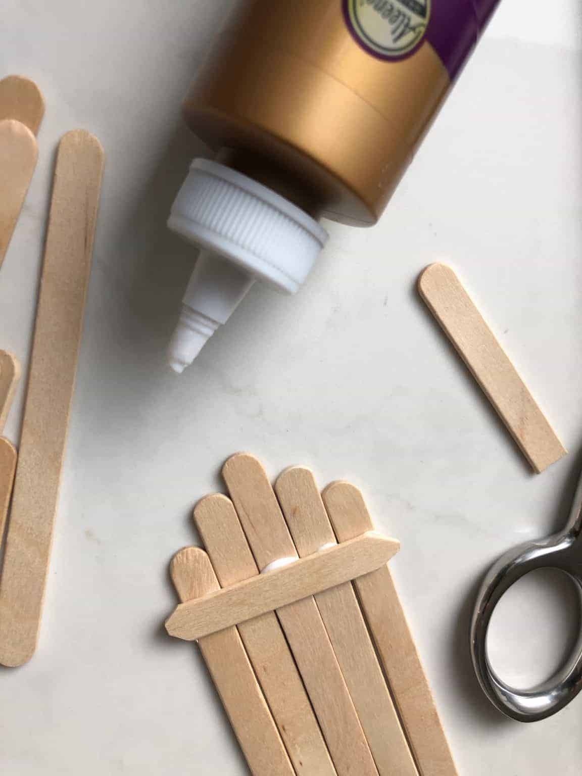 Popsicle stick sled ornaments for festive fun ️ 🛷 Dive into creativity ...